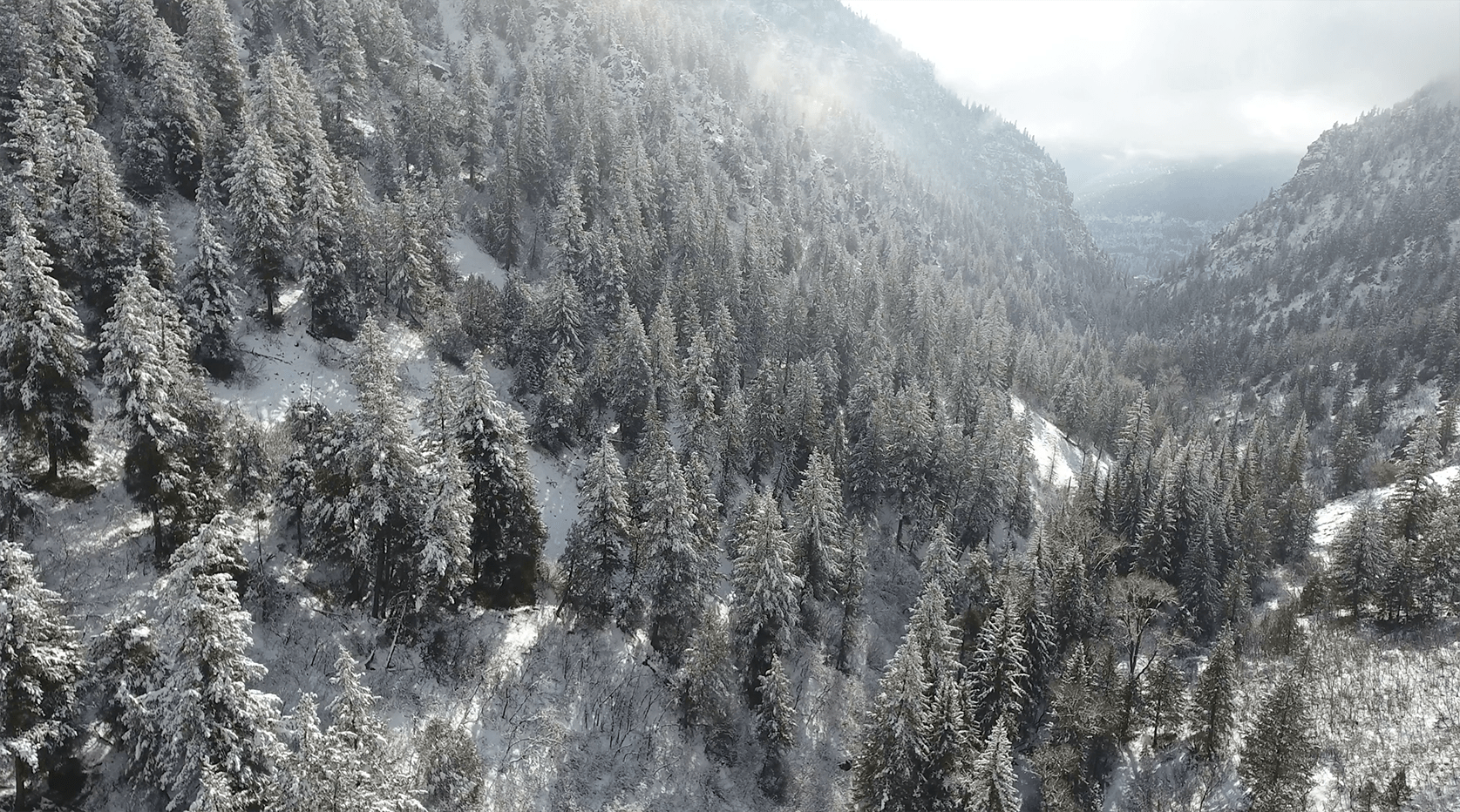Drone Flying Through Snow Covered Mountains 4k Royalty Free Stock Video